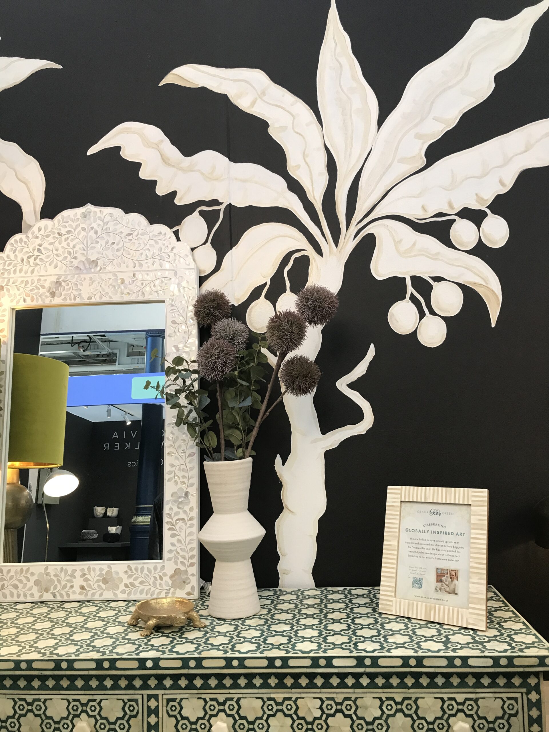 Painting a mural for the Graham & Green stand at Decorex.